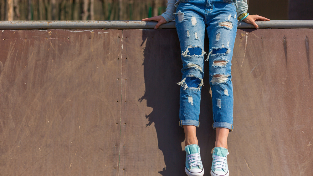 Here's A Guide On How To Wear Distressed Jeans