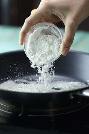 Add refined flour and cook on low flame for 20-30 seconds.